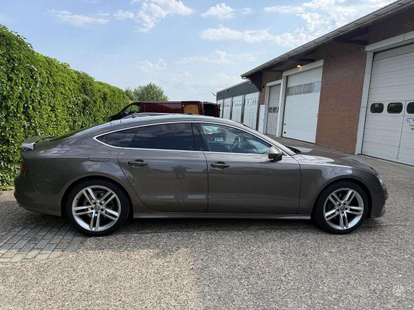 Brown Audi A7 Sportback 2013 in Kazlu Ruda, with an engine capacity of 2.97 L and mileage of 245 thousand km for 9999 €, photo 2 on AUTOMOTO.COM.LV