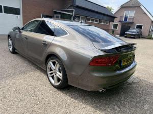 Brown Audi A7 Sportback 2013 in Kazlu Ruda, with an engine capacity of 2.97 L and mileage of 245 thousand km for 9999 €, photo 5 on AUTOMOTO.COM.LV