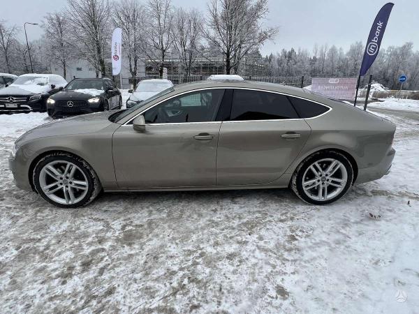 Brown Audi A7 Sportback 2012 in Kaunas, with an engine capacity of 3.00 L and mileage of 272 thousand km for 10950 €, photo 8 on AUTOMOTO.COM.LV