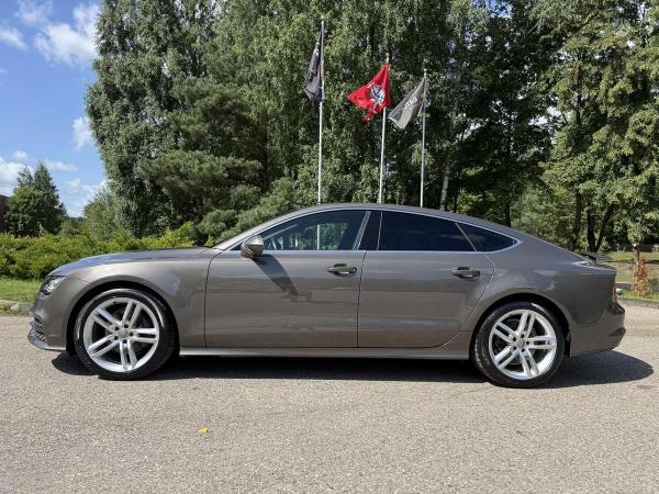 Grey Audi A7 Sportback 2013 in Kazlu Ruda, with an engine capacity of 2.97 L and mileage of 245 thousand km for 11000 €, photo 8 on AUTOMOTO.COM.LV