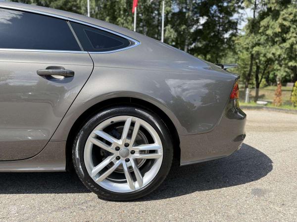 Grey Audi A7 Sportback 2013 in Kazlu Ruda, with an engine capacity of 2.97 L and mileage of 245 thousand km for 11000 €, photo 9 on AUTOMOTO.COM.LV