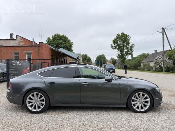Grey Audi A7 Sportback 2015 in Ventspils, with an engine capacity of 3.00 L and mileage of 305 thousand km for 16900 €, photo 7 on AUTOMOTO.COM.LV