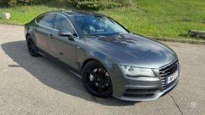 Grey Audi A7 Sportback 2012 in Siauliai, with an engine capacity of 3.00 L and mileage of 318 thousand km for 11300 €, photo 4 on AUTOMOTO.COM.LV