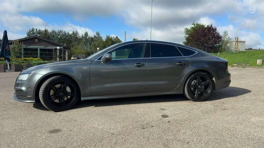 Grey Audi A7 Sportback 2012 in Siauliai, with an engine capacity of 3.00 L and mileage of 318 thousand km for 11300 €, photo 5 on AUTOMOTO.COM.LV
