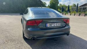 Grey Audi A7 Sportback 2012 in Siauliai, with an engine capacity of 3.00 L and mileage of 318 thousand km for 11300 €, photo 6 on AUTOMOTO.COM.LV