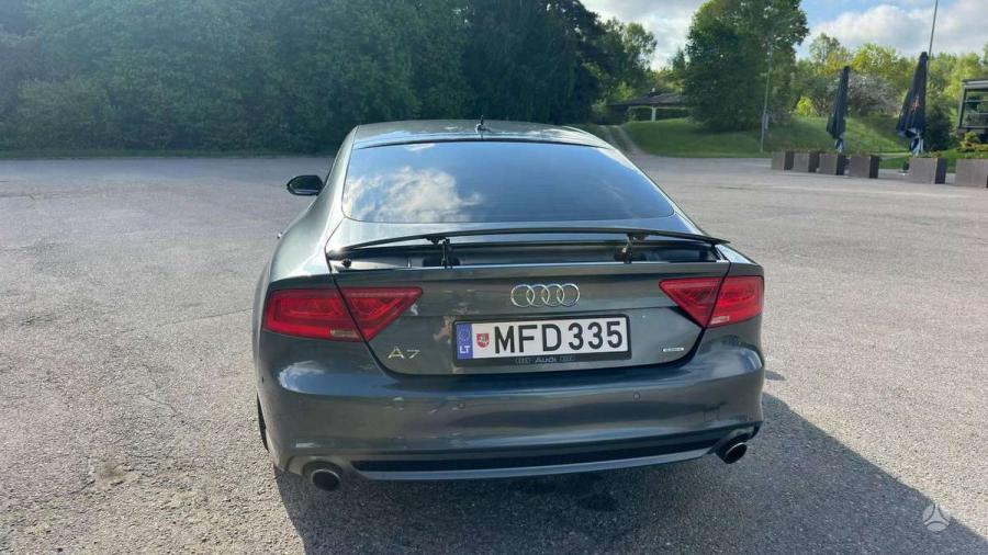 Grey Audi A7 Sportback 2012 in Siauliai, with an engine capacity of 3.00 L and mileage of 318 thousand km for 11300 €, photo 7 on AUTOMOTO.COM.LV