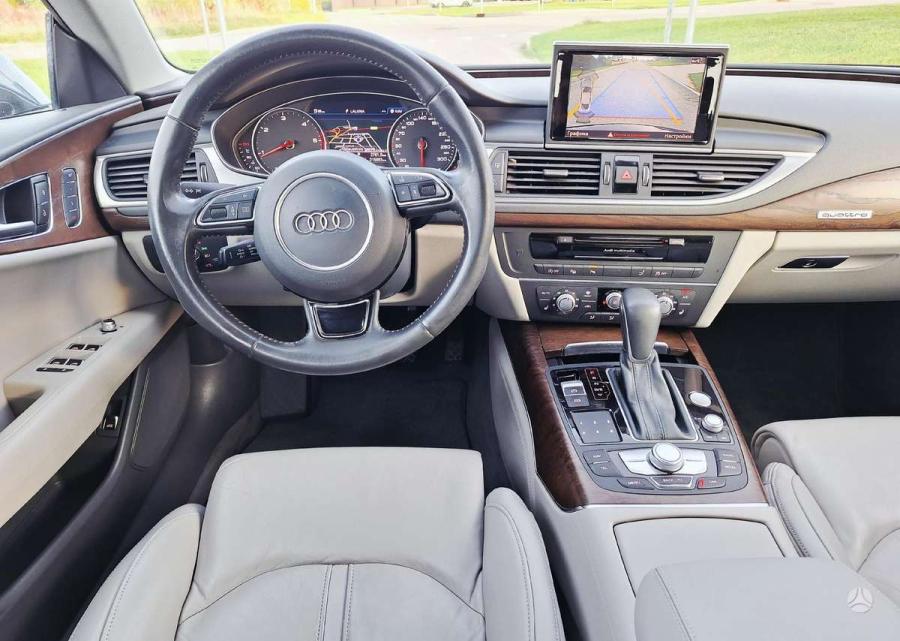 Grey Audi A7 Sportback 2015 in Klaipeda, with an engine capacity of 3.00 L and mileage of 215 thousand km for 16200 €, photo 14 on AUTOMOTO.COM.LV