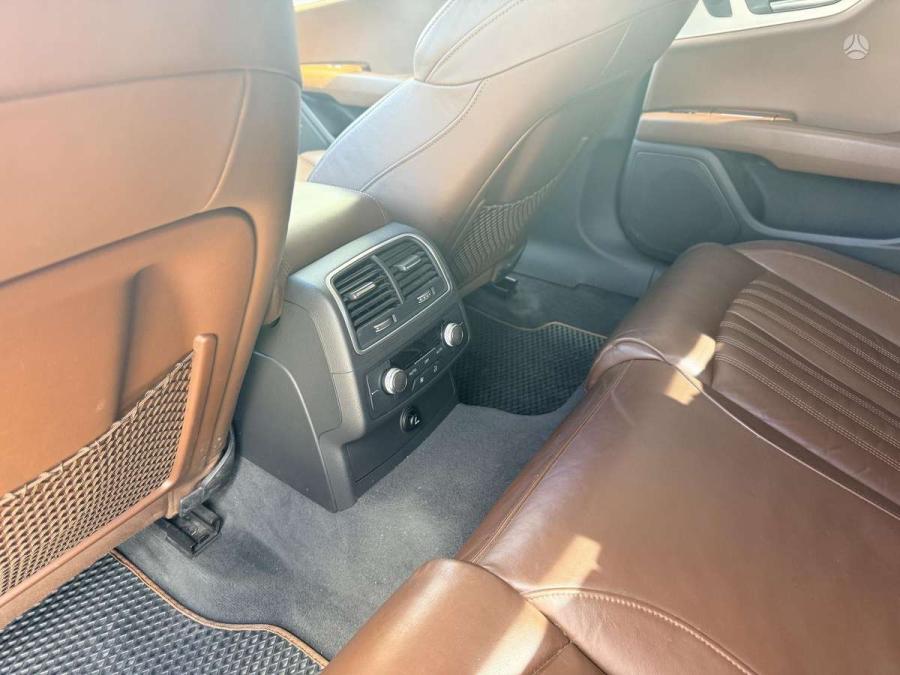 Grey Audi A7 Sportback 2015 in Vilnius, with an engine capacity of 2.97 L and mileage of 347 thousand km for 14500 €, photo 13 on AUTOMOTO.COM.LV