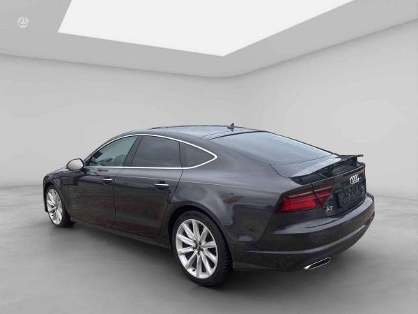 Grey Audi A7 Sportback 2015 in Kaunas, with an engine capacity of 3.00 L and mileage of 302 thousand km for 15990 €, photo 4 on AUTOMOTO.COM.LV