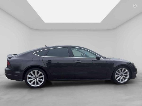 Grey Audi A7 Sportback 2015 in Kaunas, with an engine capacity of 3.00 L and mileage of 302 thousand km for 15990 €, photo 7 on AUTOMOTO.COM.LV