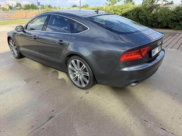 Grey Audi A7 Sportback 2011 in Vilnius, with an engine capacity of 2.97 L and mileage of 240 thousand km for 12600 €, photo 3 on AUTOMOTO.COM.LV