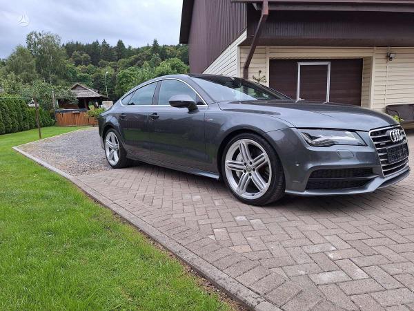 Grey Audi A7 Sportback 2014 in Kaunas, with an engine capacity of 3.00 L and mileage of 199 thousand km for 14300 €, photo 1 on AUTOMOTO.COM.LV