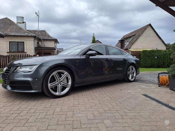 Grey Audi A7 Sportback 2014 in Kaunas, with an engine capacity of 3.00 L and mileage of 199 thousand km for 14300 €, photo 4 on AUTOMOTO.COM.LV