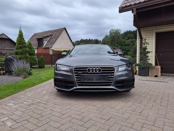 Grey Audi A7 Sportback 2014 in Kaunas, with an engine capacity of 3.00 L and mileage of 199 thousand km for 14300 €, photo 7 on AUTOMOTO.COM.LV