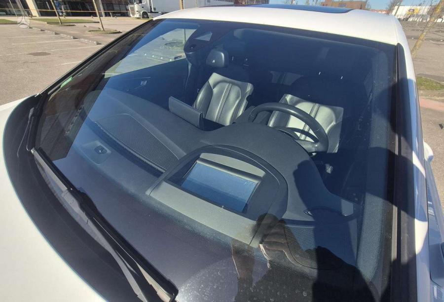 White Audi A7 Sportback 2016 in Klaipeda, with an engine capacity of 2.00 L and mileage of 129 thousand km for 17500 €, photo 17 on AUTOMOTO.COM.LV
