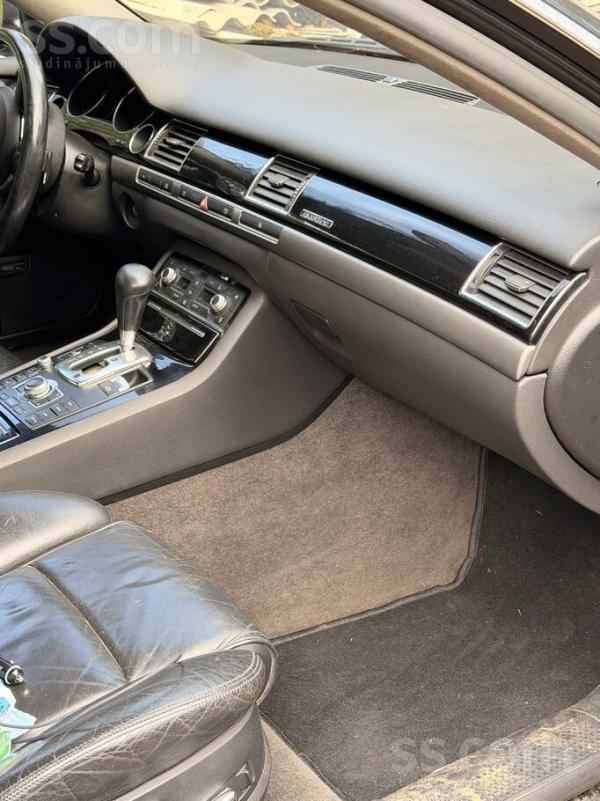 Black Audi A8 2007 in Riga, with an engine capacity of 4.00 L and mileage of 244 thousand km for 4000 €, photo 4 on AUTOMOTO.COM.LV