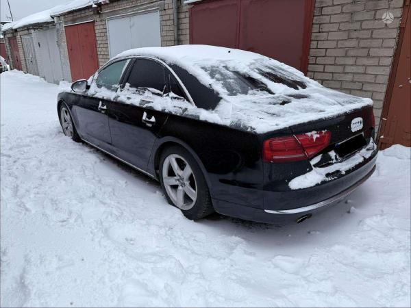 Black Audi A8 2011 in Klaipeda, with an engine capacity of 3.00 L and mileage of 290 thousand km for 5100 €, photo 1 on AUTOMOTO.COM.LV