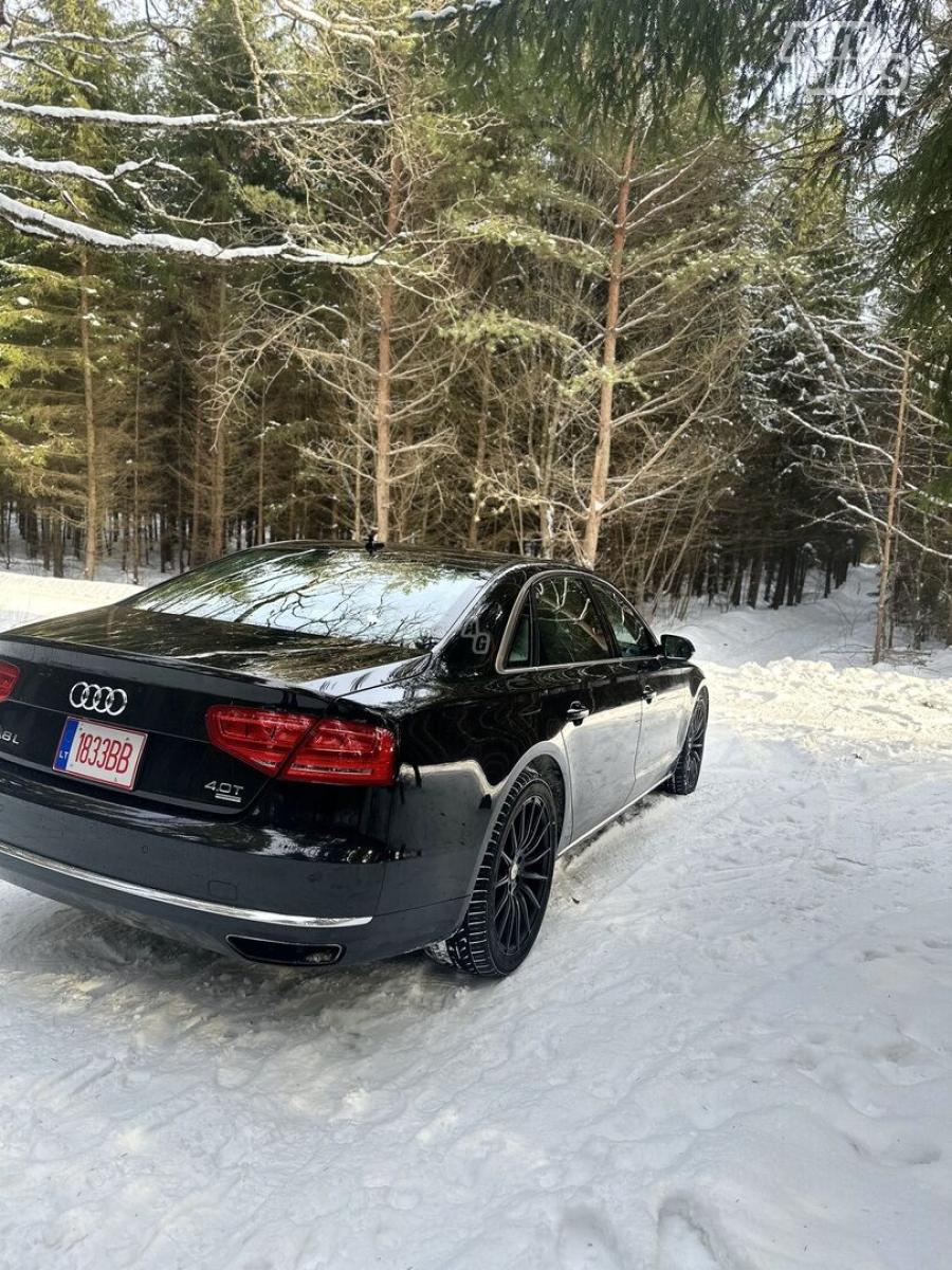 Black Audi A8 2013 in Kaunas, with an engine capacity of 4.00 L and mileage of 232 thousand km for 14600 €, photo 4 on AUTOMOTO.COM.LV