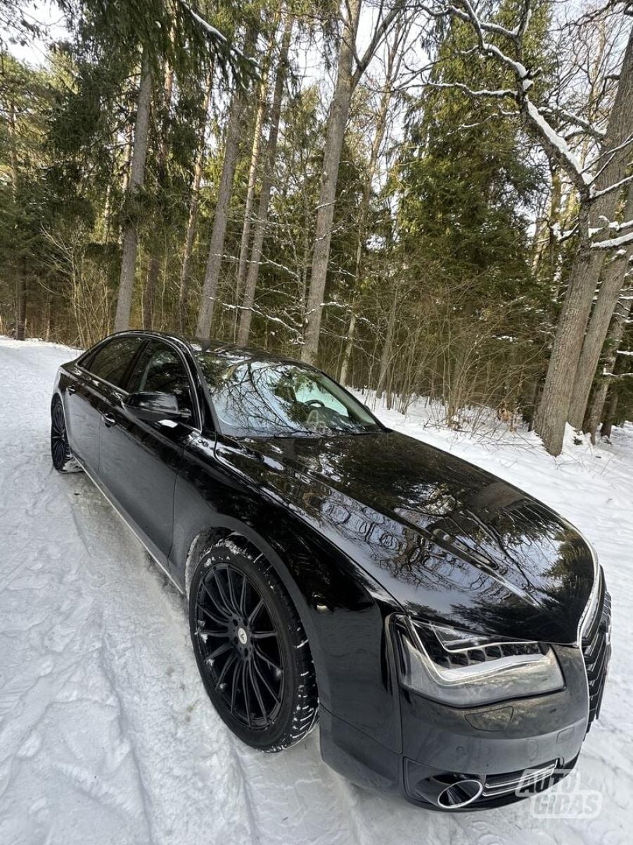Black Audi A8 2013 in Kaunas, with an engine capacity of 4.00 L and mileage of 232 thousand km for 14600 €, photo 7 on AUTOMOTO.COM.LV