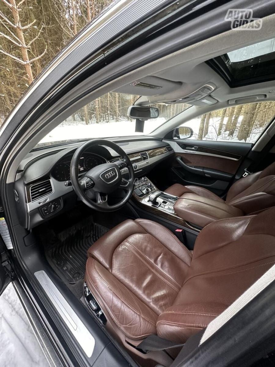 Black Audi A8 2013 in Kaunas, with an engine capacity of 4.00 L and mileage of 232 thousand km for 14600 €, photo 8 on AUTOMOTO.COM.LV