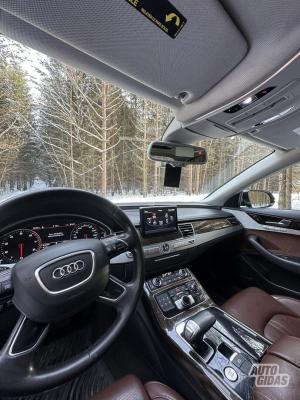 Black Audi A8 2013 in Kaunas, with an engine capacity of 4.00 L and mileage of 232 thousand km for 14600 €, photo 16 on AUTOMOTO.COM.LV