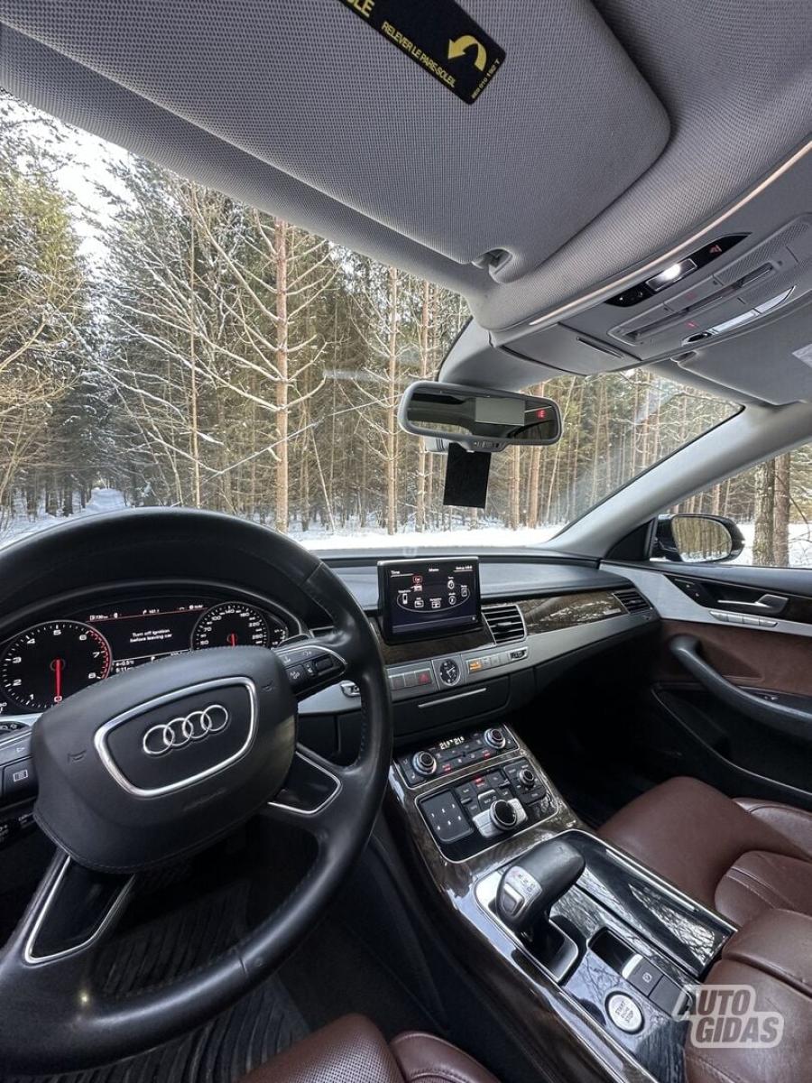 Black Audi A8 2013 in Kaunas, with an engine capacity of 4.00 L and mileage of 232 thousand km for 14600 €, photo 16 on AUTOMOTO.COM.LV