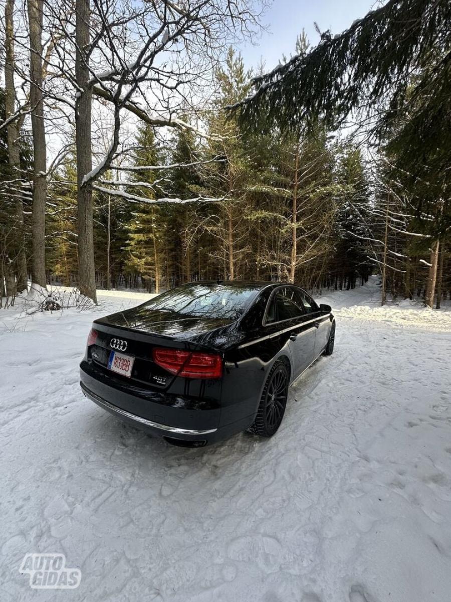 Black Audi A8 2013 in Kaunas, with an engine capacity of 4.00 L and mileage of 232 thousand km for 14600 €, photo 21 on AUTOMOTO.COM.LV