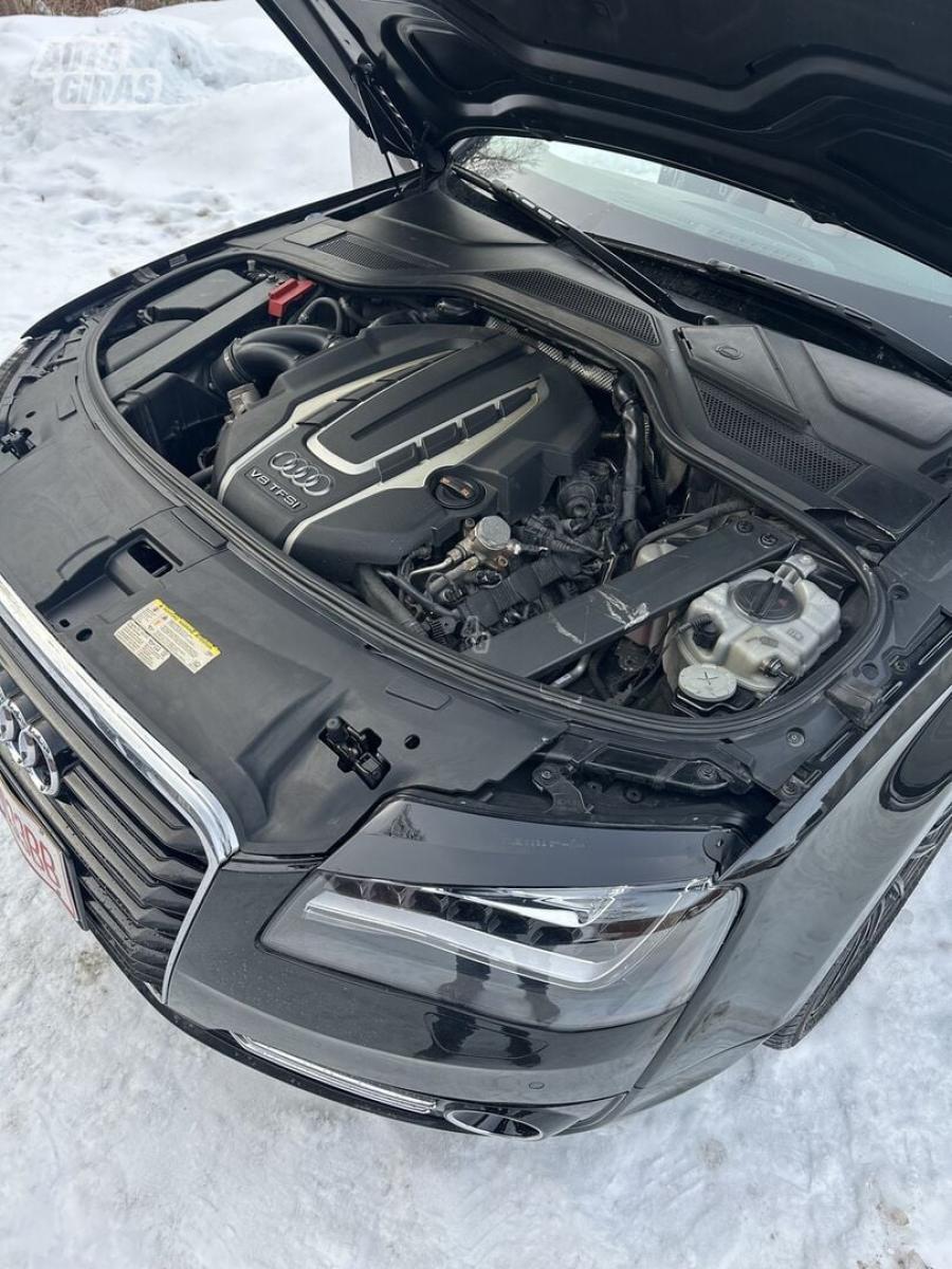 Black Audi A8 2013 in Kaunas, with an engine capacity of 4.00 L and mileage of 232 thousand km for 14600 €, photo 34 on AUTOMOTO.COM.LV