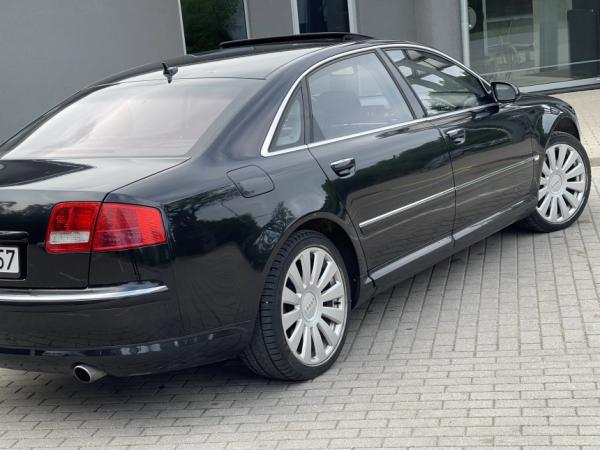 Black Audi A8 2005 in Riga, with an engine capacity of 4.20 L and mileage of 285 thousand km for 6650 €, photo 5 on AUTOMOTO.COM.LV