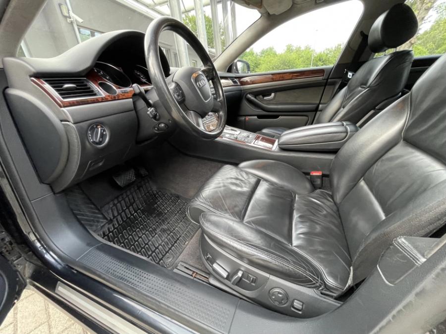 Black Audi A8 2005 in Riga, with an engine capacity of 4.20 L and mileage of 285 thousand km for 6650 €, photo 23 on AUTOMOTO.COM.LV
