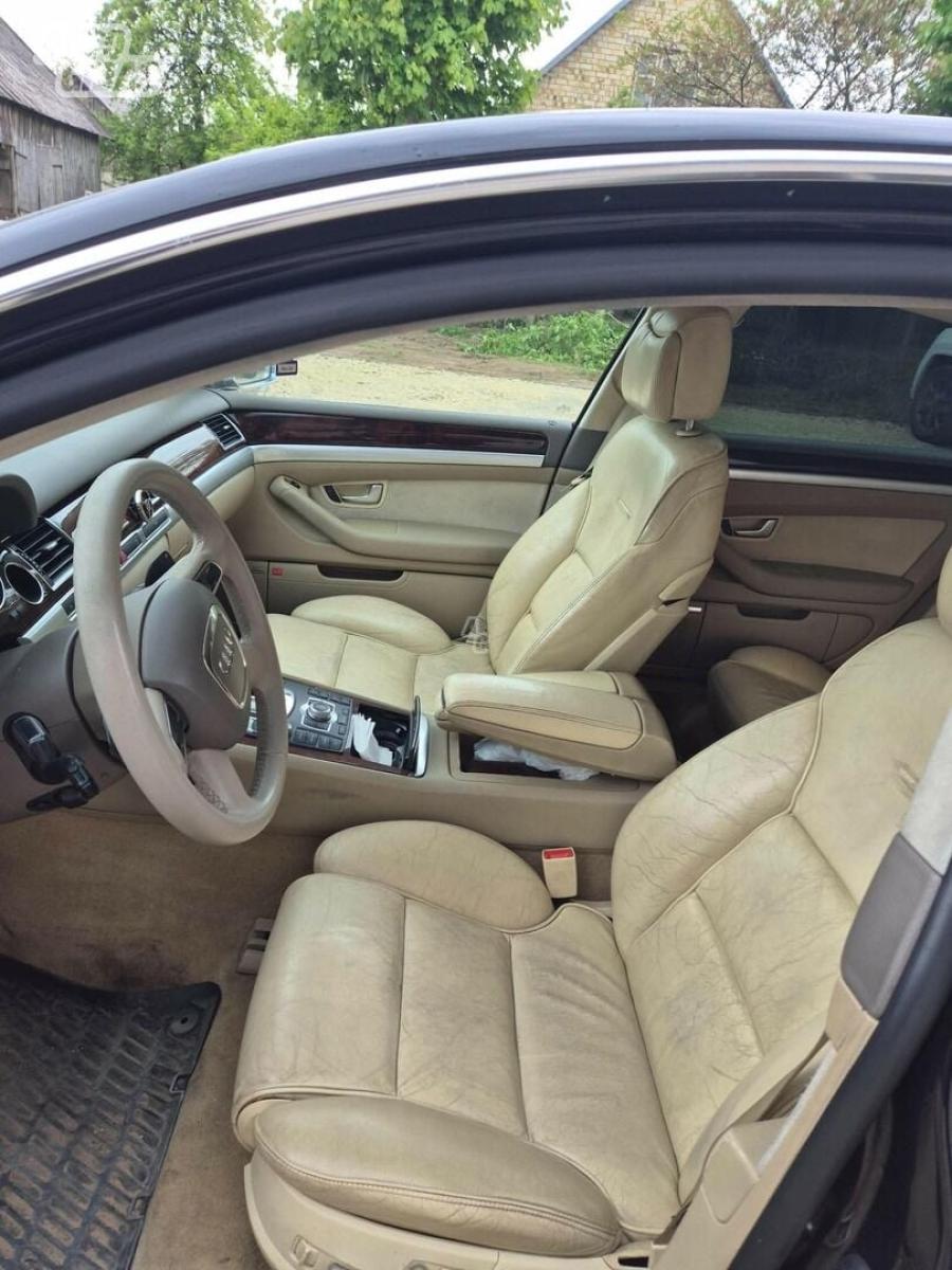 Black Audi A8 2006 in Plunge, with an engine capacity of 3.00 L and mileage of 339 thousand km for 5600 €, photo 7 on AUTOMOTO.COM.LV