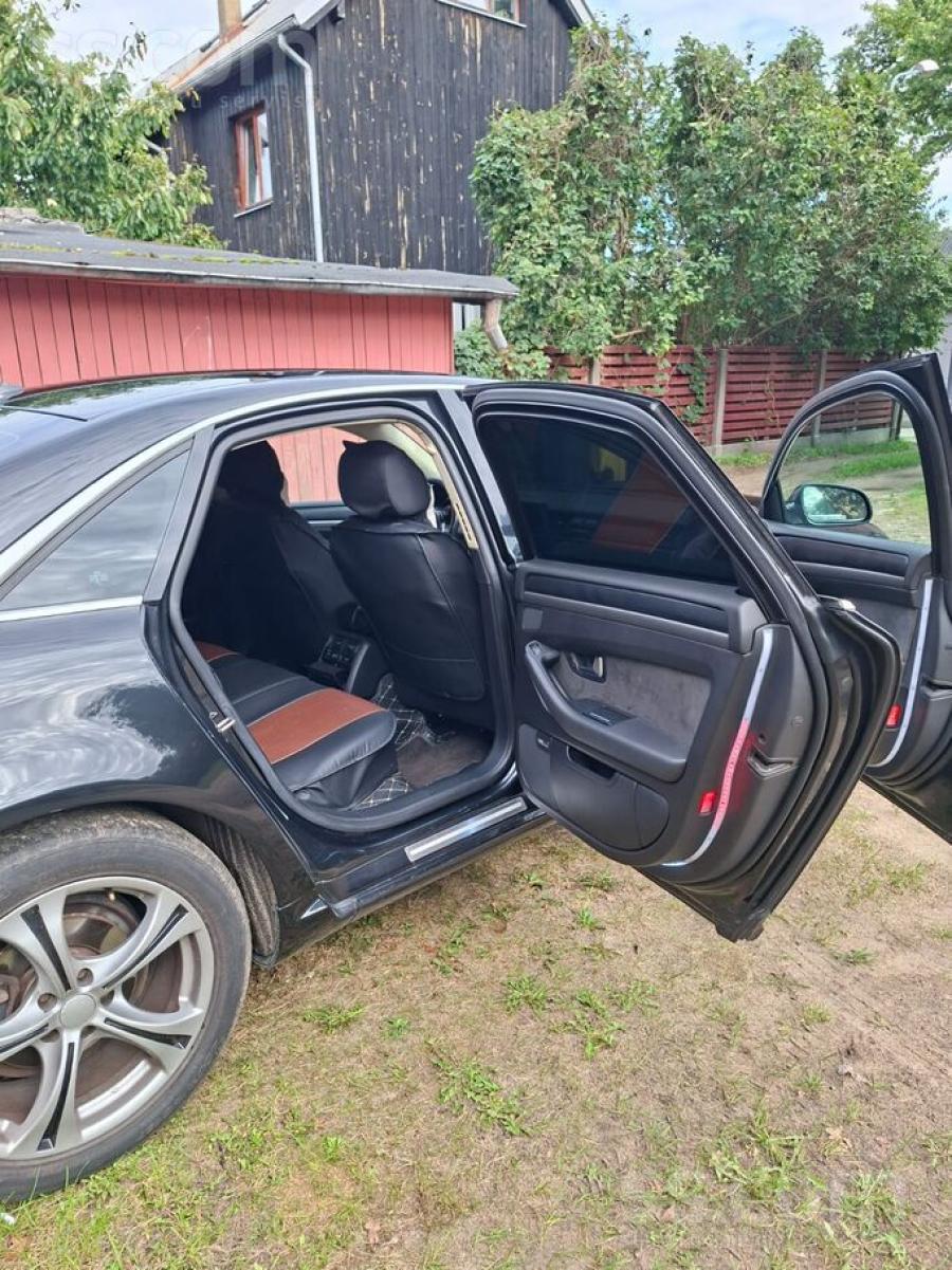 Black Audi A8 2006 in Riga, with an engine capacity of 3.00 L and mileage of 190 thousand km for 6080 €, photo 12 on AUTOMOTO.COM.LV