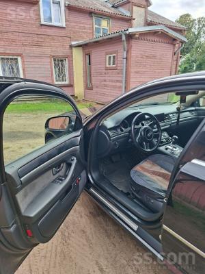 Black Audi A8 2006 in Riga, with an engine capacity of 3.00 L and mileage of 190 thousand km for 6080 €, photo 13 on AUTOMOTO.COM.LV