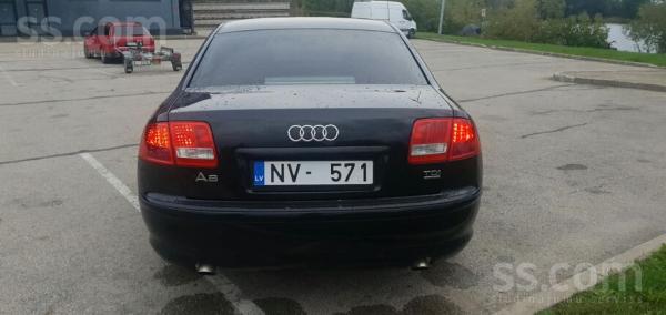 Black Audi A8 2006 in Riga, with an engine capacity of 3.00 L and mileage of 315 thousand km for 4999 €, photo 7 on AUTOMOTO.COM.LV