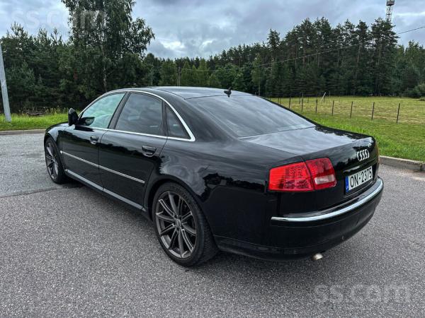 Black Audi A8 2007 in Riga, with an engine capacity of 3.00 L and mileage of 577 thousand km for 3750 €, photo 2 on AUTOMOTO.COM.LV