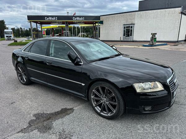 Black Audi A8 2007 in Riga, with an engine capacity of 3.00 L and mileage of 577 thousand km for 3750 €, photo 3 on AUTOMOTO.COM.LV