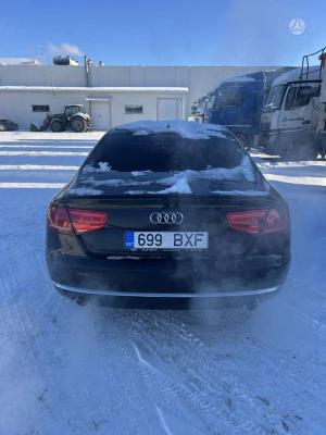 Black Audi A8 2010 in Kaunas, with an engine capacity of 3.00 L and mileage of 294 thousand km for 6350 €, photo 3 on AUTOMOTO.COM.LV