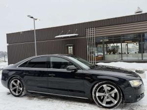 Black Audi A8 2010 in Kaunas, with an engine capacity of 4.13 L and mileage of 340 thousand km for 9350 €, photo 15 on AUTOMOTO.COM.LV