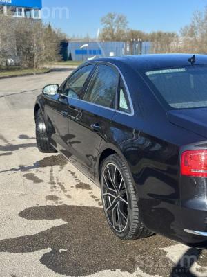 Black Audi A8 2010 in Riga, with an engine capacity of 4.20 L and mileage of 169 thousand km for 11600 €, photo 4 on AUTOMOTO.COM.LV