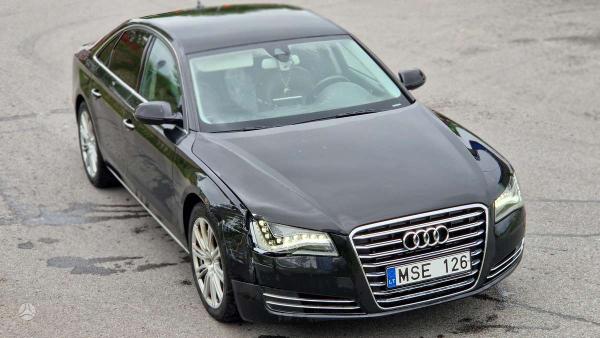 Black Audi A8 2010 in Vilnius, with an engine capacity of 4.13 L and mileage of 410 thousand km for 7500 €, photo 7 on AUTOMOTO.COM.LV