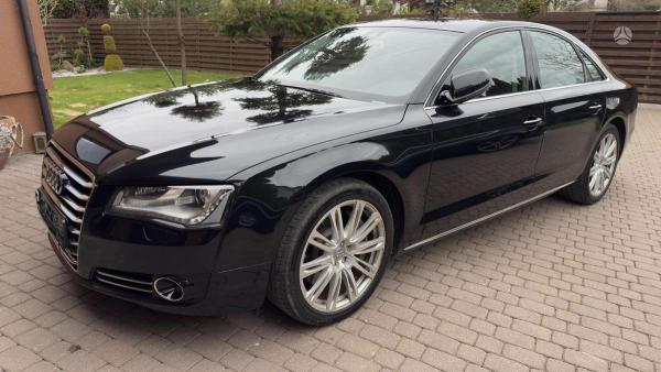 Black Audi A8 2010 in Kupiskis, with an engine capacity of 4.13 L and mileage of 290 thousand km for 10690 €, photo 1 on AUTOMOTO.COM.LV