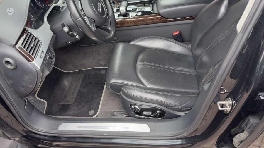 Black Audi A8 2010 in Kupiskis, with an engine capacity of 4.13 L and mileage of 290 thousand km for 10690 €, photo 11 on AUTOMOTO.COM.LV