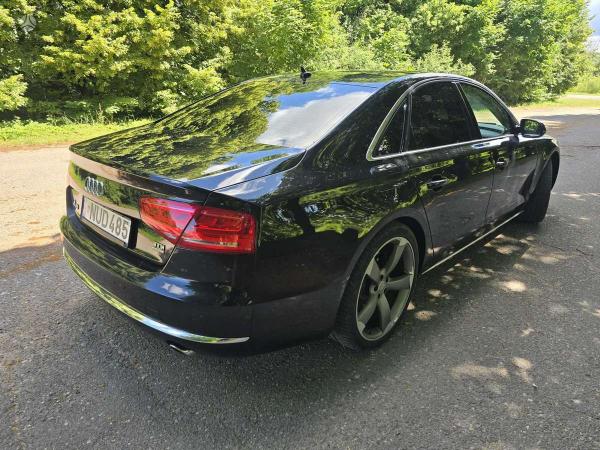 Black Audi A8 2010 in Taurage, with an engine capacity of 4.13 L and mileage of 290 thousand km for 10000 €, photo 4 on AUTOMOTO.COM.LV