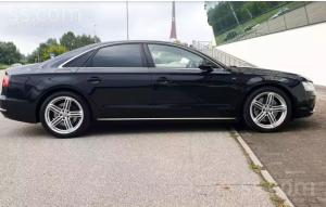 Black Audi A8 2010 in Riga, with an engine capacity of 4.20 L and mileage of 227 thousand km for 11500 €, photo 4 on AUTOMOTO.COM.LV