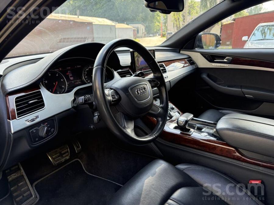 Black Audi A8 2010 in Riga, with an engine capacity of 4.20 L and mileage of 227 thousand km for 11500 €, photo 6 on AUTOMOTO.COM.LV