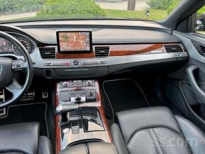 Black Audi A8 2010 in Riga, with an engine capacity of 3.00 L and mileage of 226 thousand km for 9750 €, photo 17 on AUTOMOTO.COM.LV