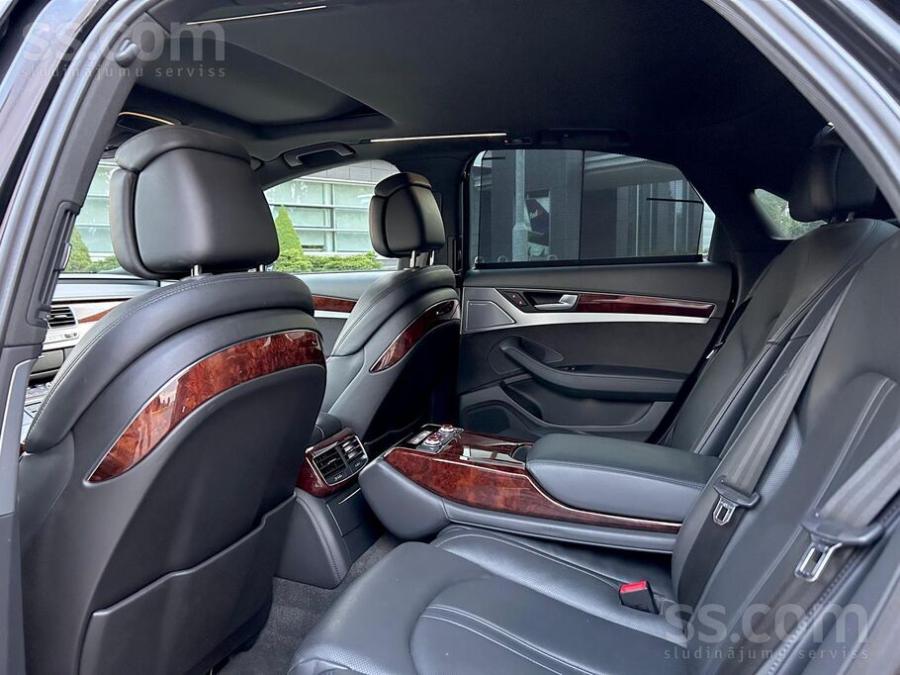 Black Audi A8 2010 in Riga, with an engine capacity of 3.00 L and mileage of 226 thousand km for 9750 €, photo 21 on AUTOMOTO.COM.LV
