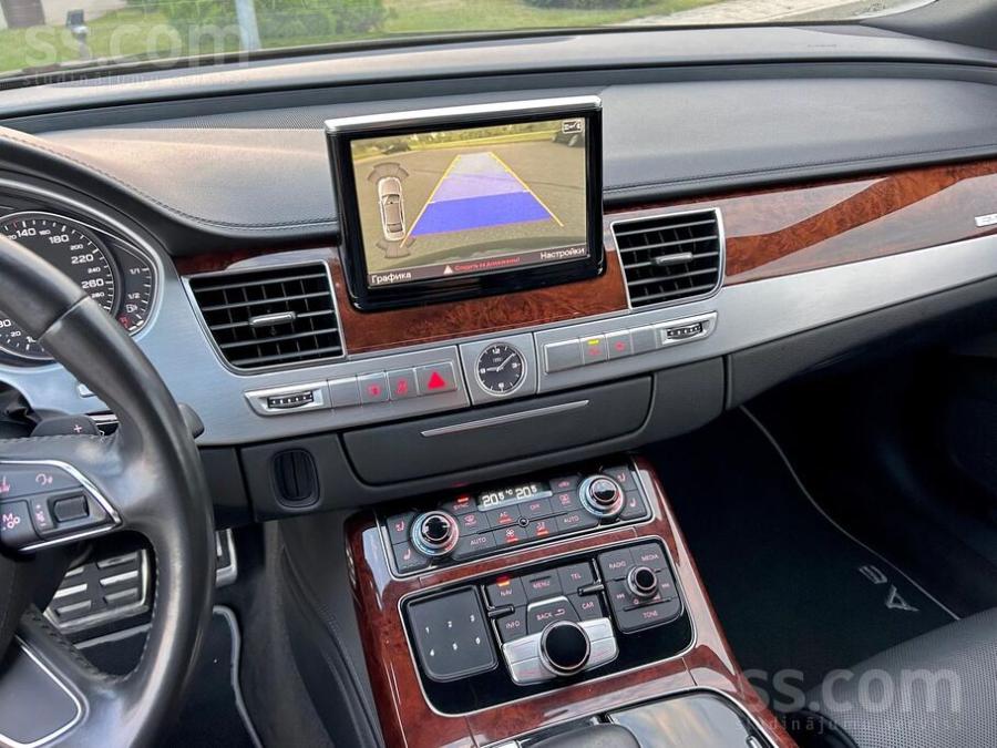 Black Audi A8 2010 in Riga, with an engine capacity of 3.00 L and mileage of 226 thousand km for 9750 €, photo 24 on AUTOMOTO.COM.LV