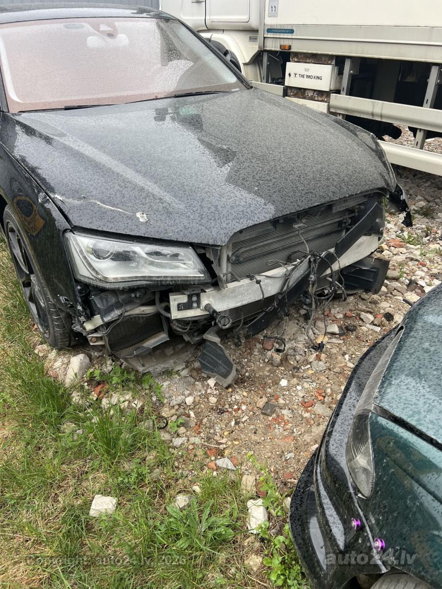 Melns Audi A8 2010 Tallina, ar dzinēja tilpumu 4.20 L un nobraukumu 300 tūkst. km par 5600 €, foto 1 vietnē AUTOMOTO.COM.LV