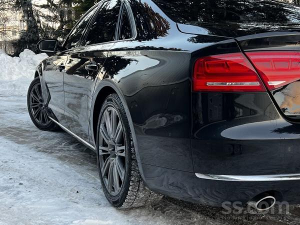 Black Audi A8 2011 in Riga, with an engine capacity of 3.00 L and mileage of 340 thousand km for 11900 €, photo 7 on AUTOMOTO.COM.LV